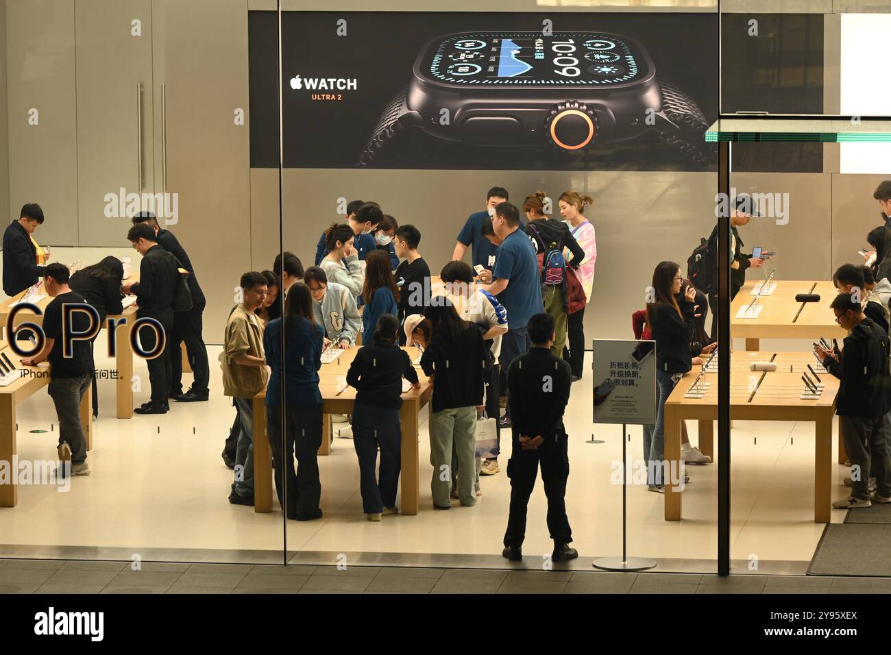 CHENGDU, CHINA - OCTOBER 8, 2024 - Customers experience Apple products ...