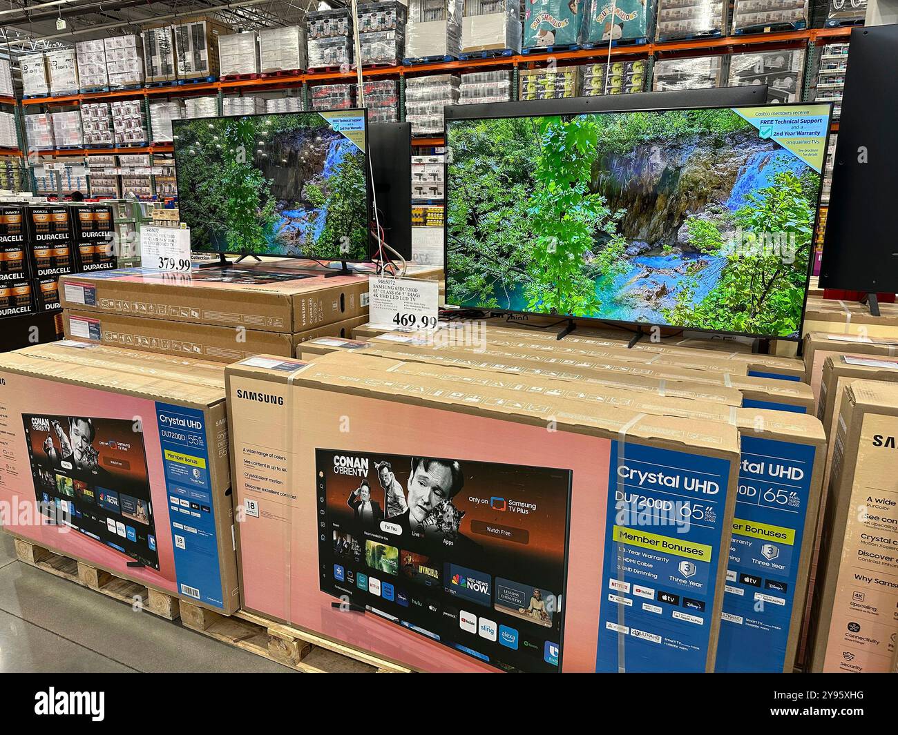 Big-screen televisions sit on display in a Costco warehouse Tuesday ...