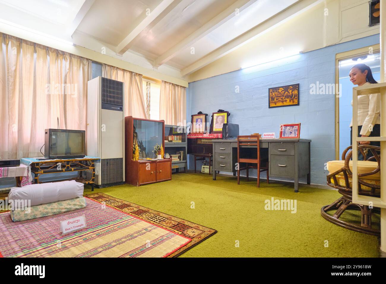 Home personal desk with books and photos. At the cinder block home of ...