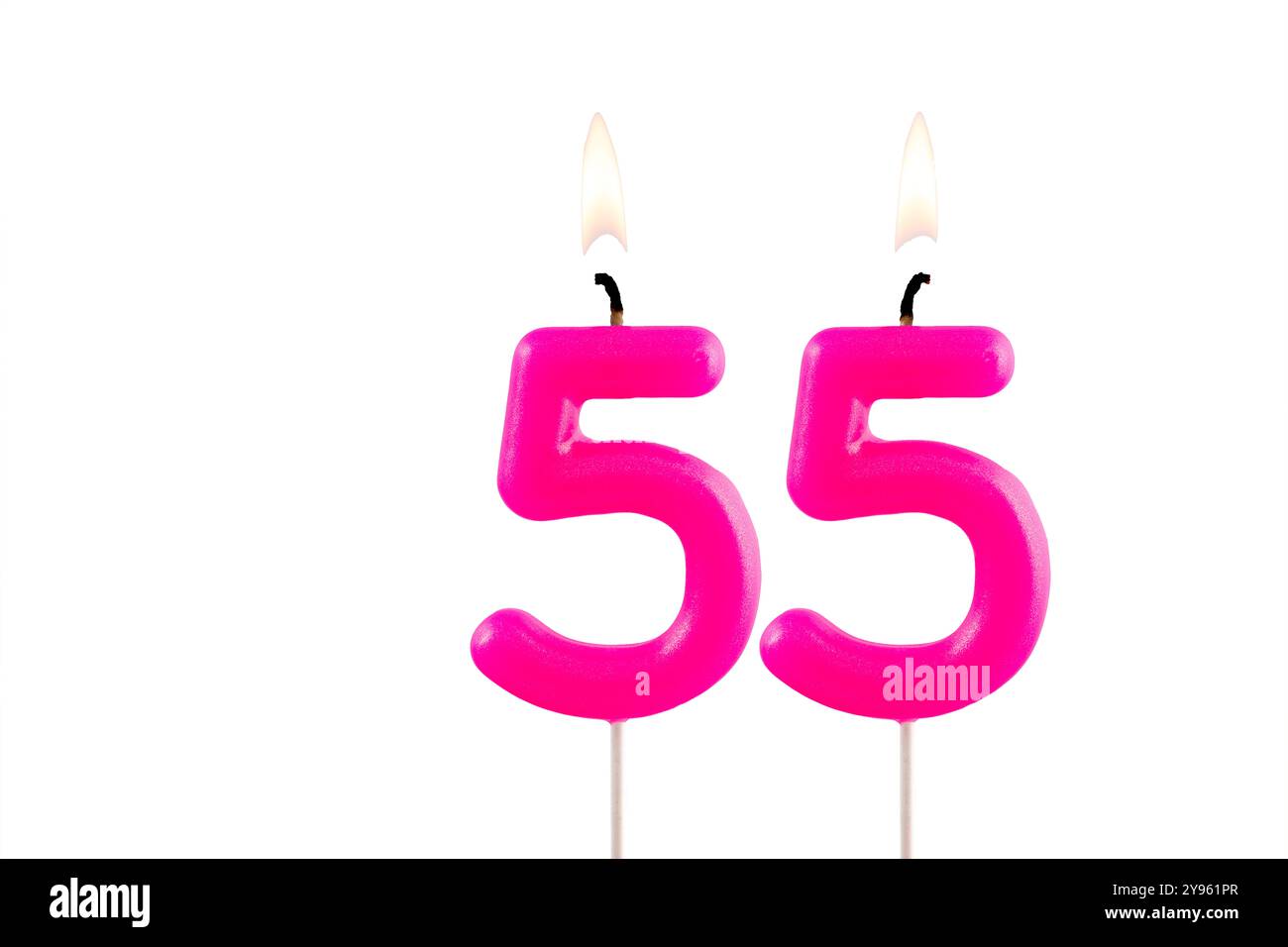Pink number 55 birthday candle on white background Stock Photo - Alamy