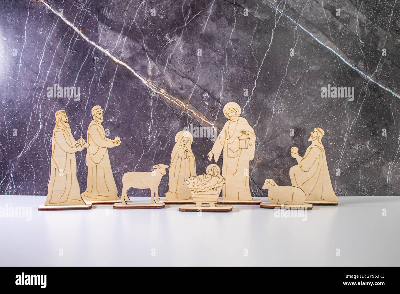 Christmas Manger scene with figurines including Jesus, Mary, Joseph and ...