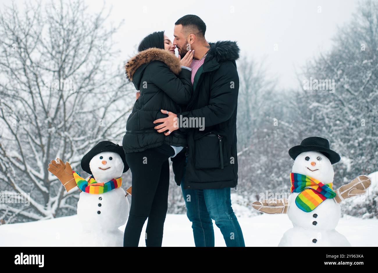 Couple kissing over winter background. Passionate kiss on christmas ...