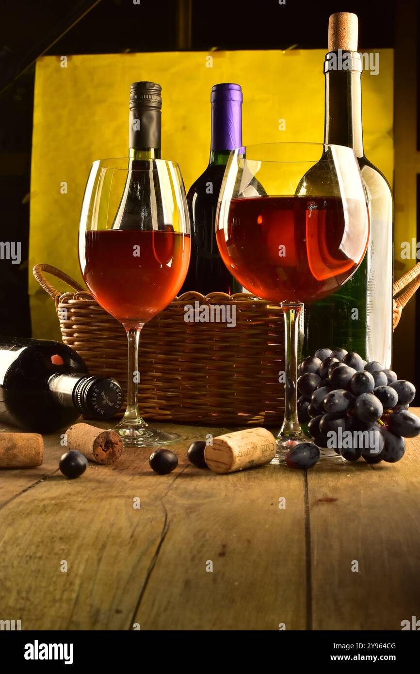 Bottle and glass of wine setting Stock Photo - Alamy