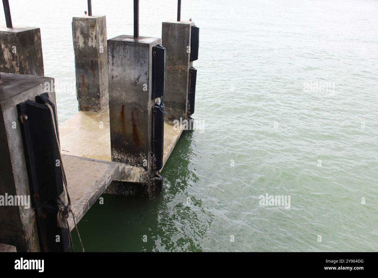 concrete pier at the harbour Stock Photo - Alamy