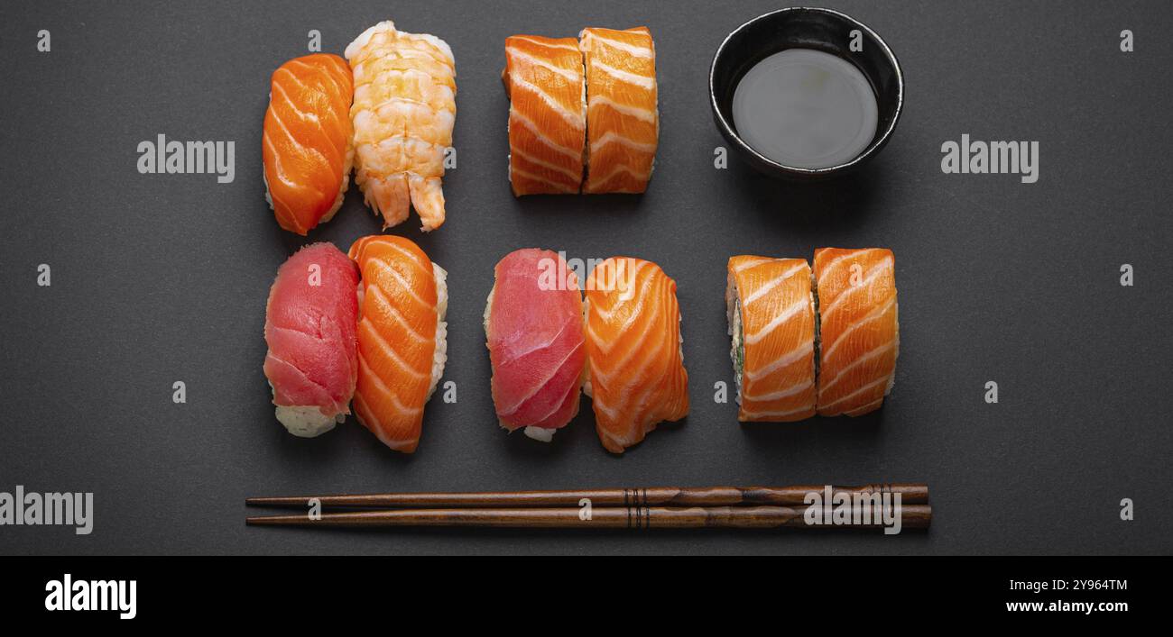 Set of traditional Japanese sushi and rolls top view with soy sauce and ...