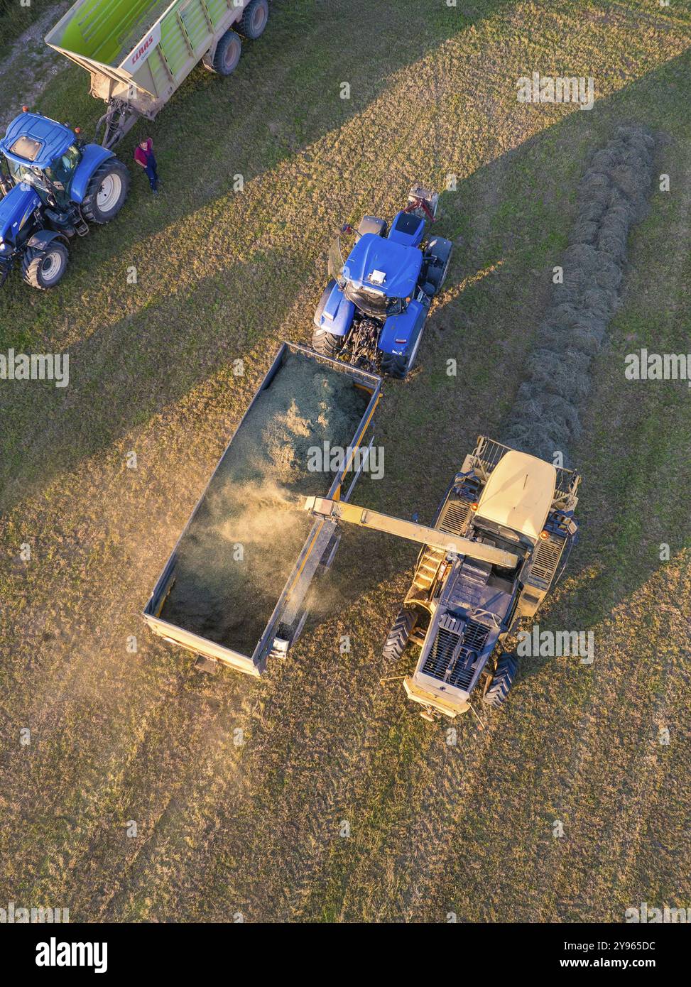 Aerial view agricultural tractors cultivating hi-res stock photography ...
