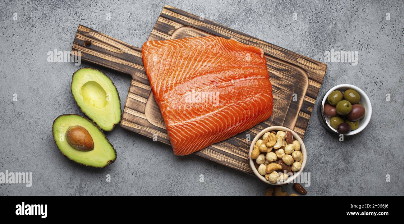 Food sources of healthy unsaturated fat: fresh raw salmon fillet ...