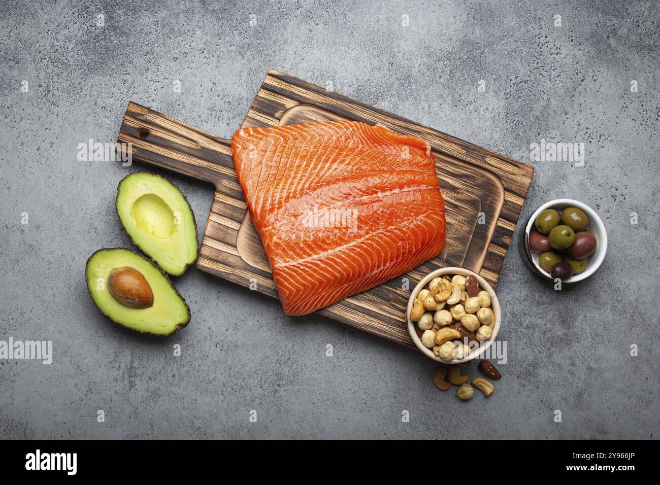 Food sources of healthy unsaturated fat: fresh raw salmon fillet ...