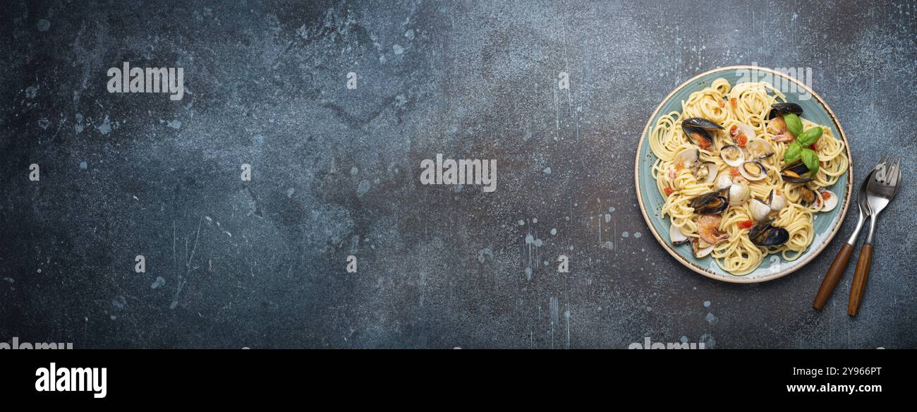 Italian seafood pasta spaghetti with mussels, shrimps, clams in tomato ...