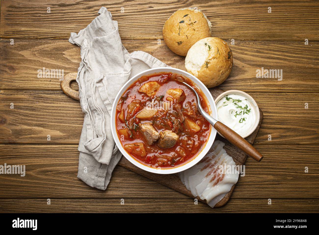 Ukrainian Borscht, red beetroot soup with meat, in white bowl with sour ...