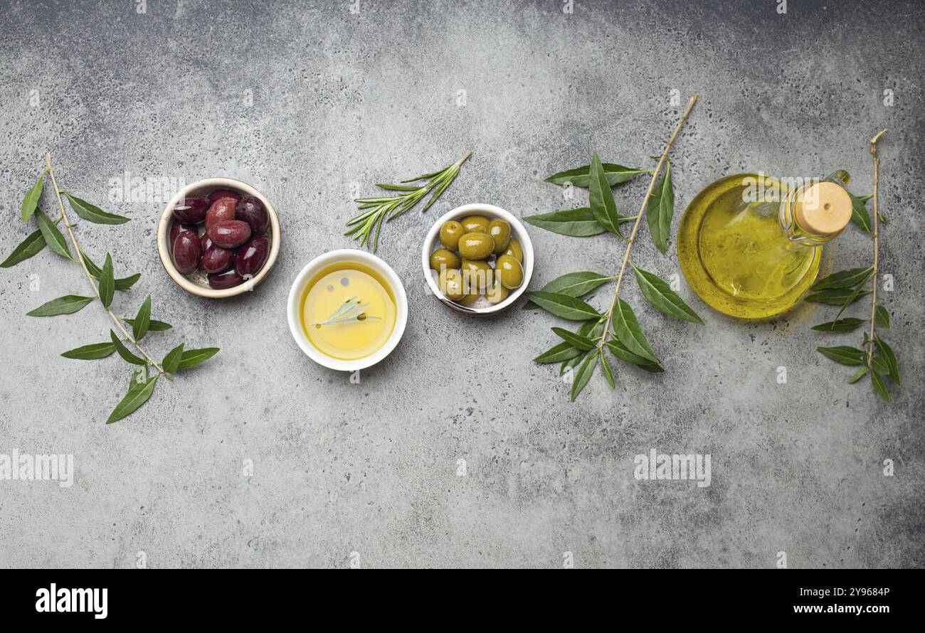 Composition with green and brown olives, extra virgin olive oil in ...