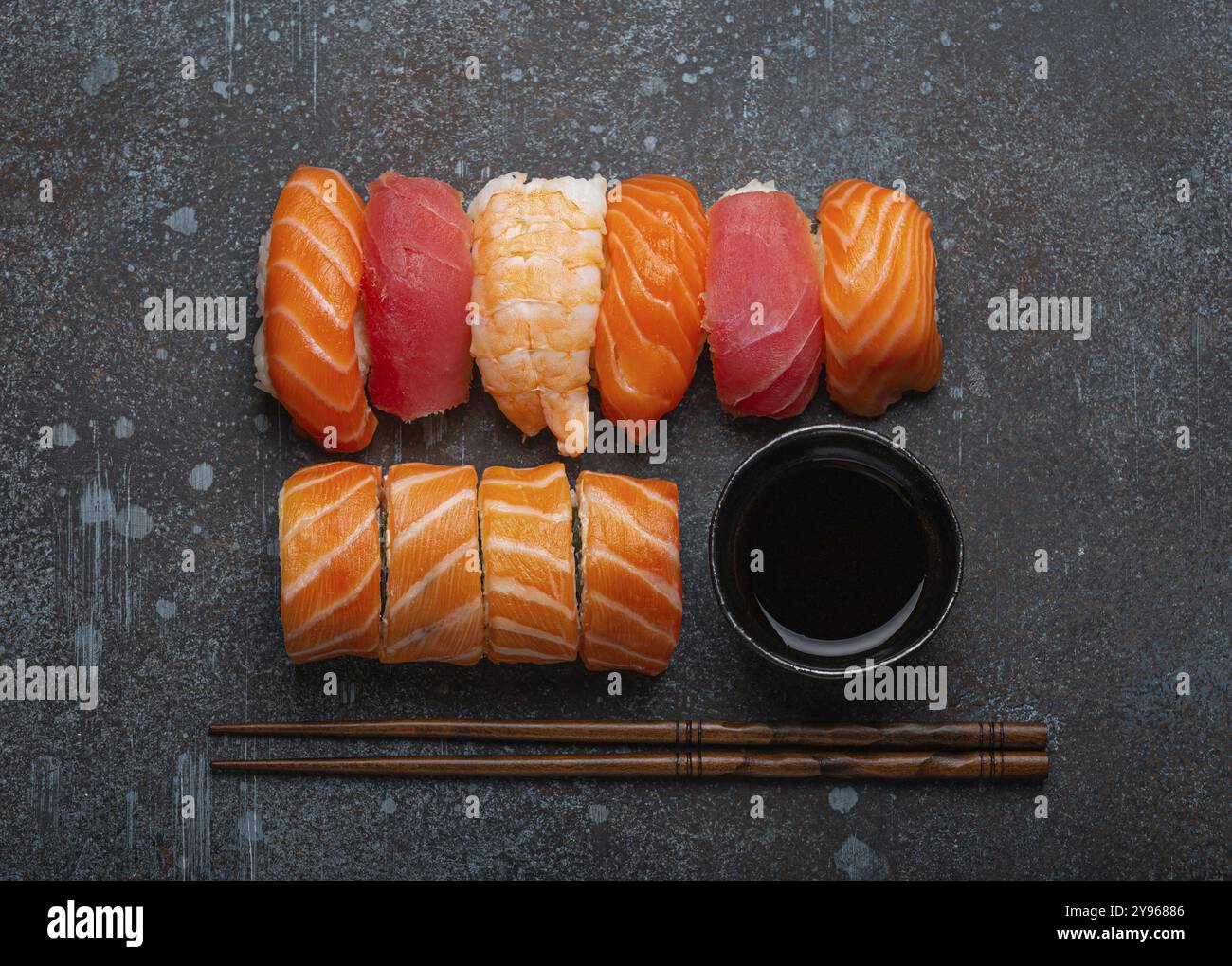 Set of traditional Japanese sushi and rolls top view with soy sauce and ...