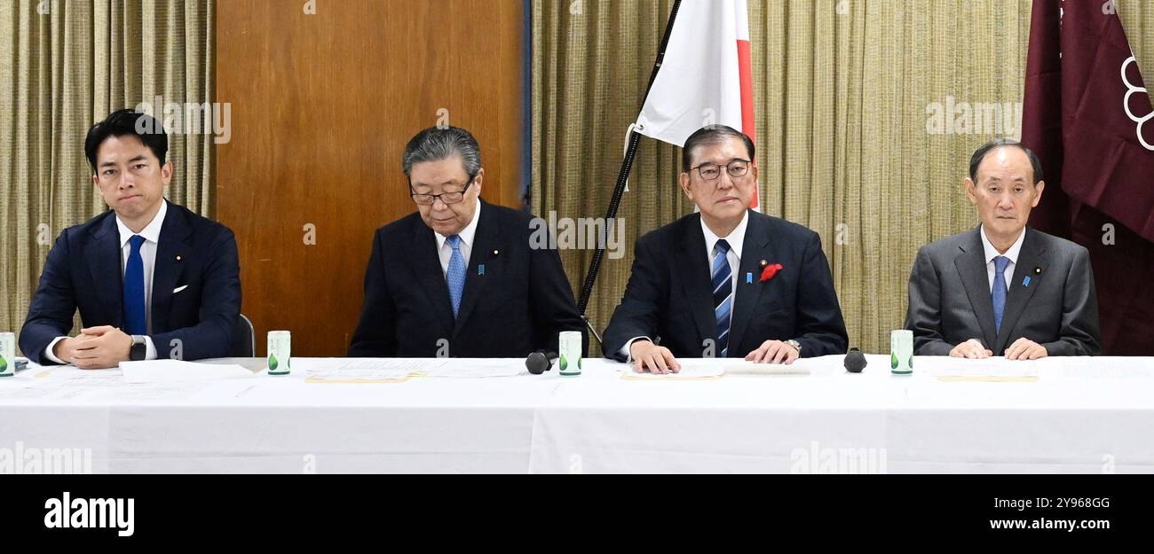 Japanese Prime Minister Shigeru Ishiba (2nd from R) attends the Liberal ...