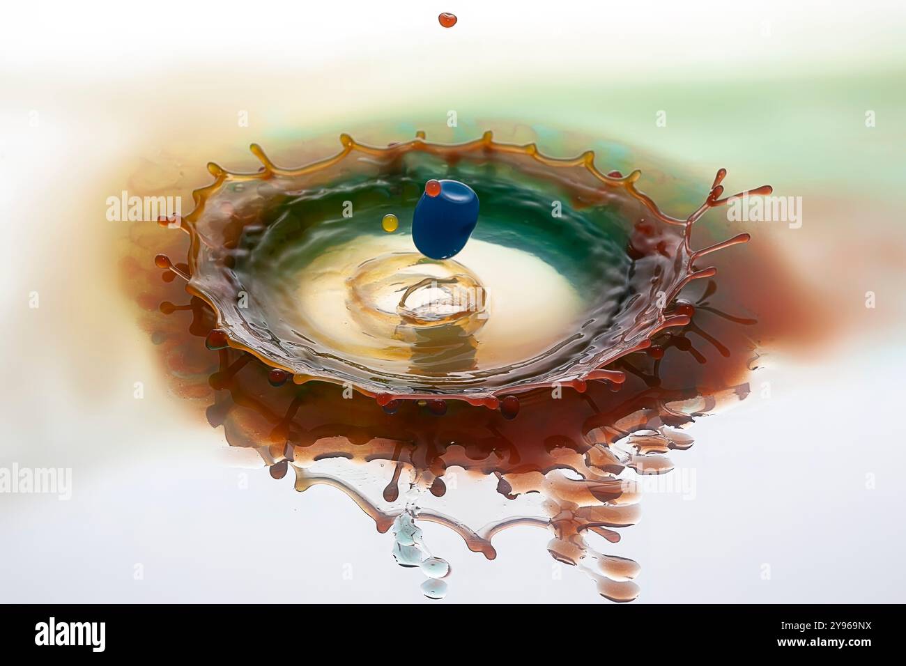 Water drop impact. High-speed photograph of secondary drop formation ...