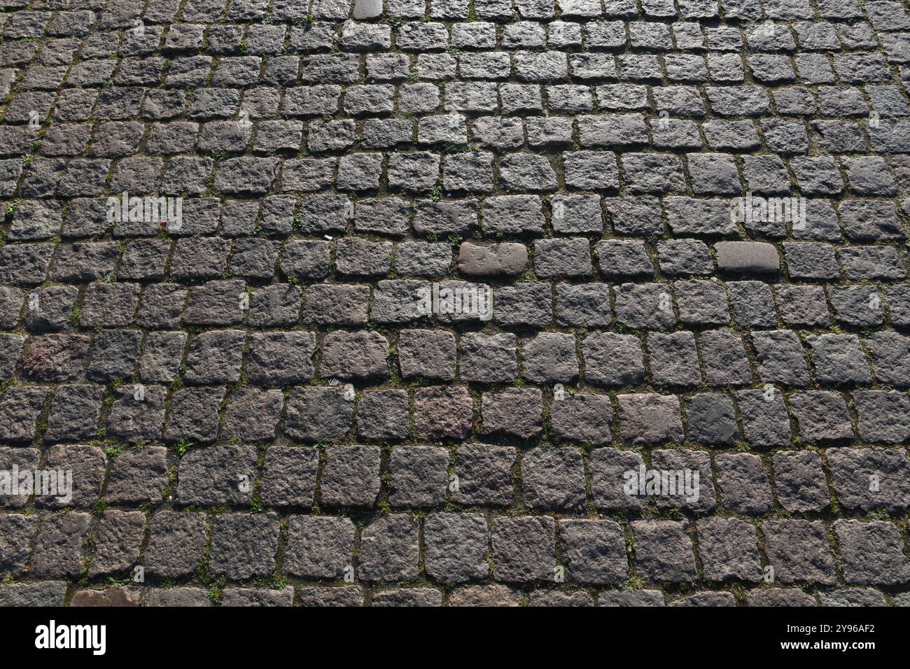 Stone road background texture. Textured background of cobblestone road ...