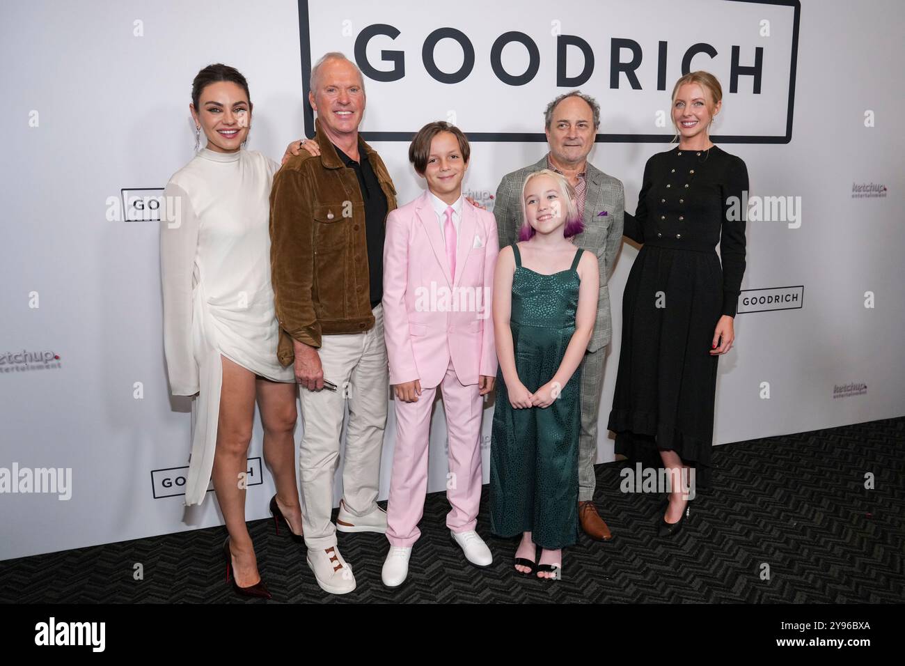 Mila Kunis, from left, Michael Keaton, Jacob Kopera, Vivien Lyra Blair ...