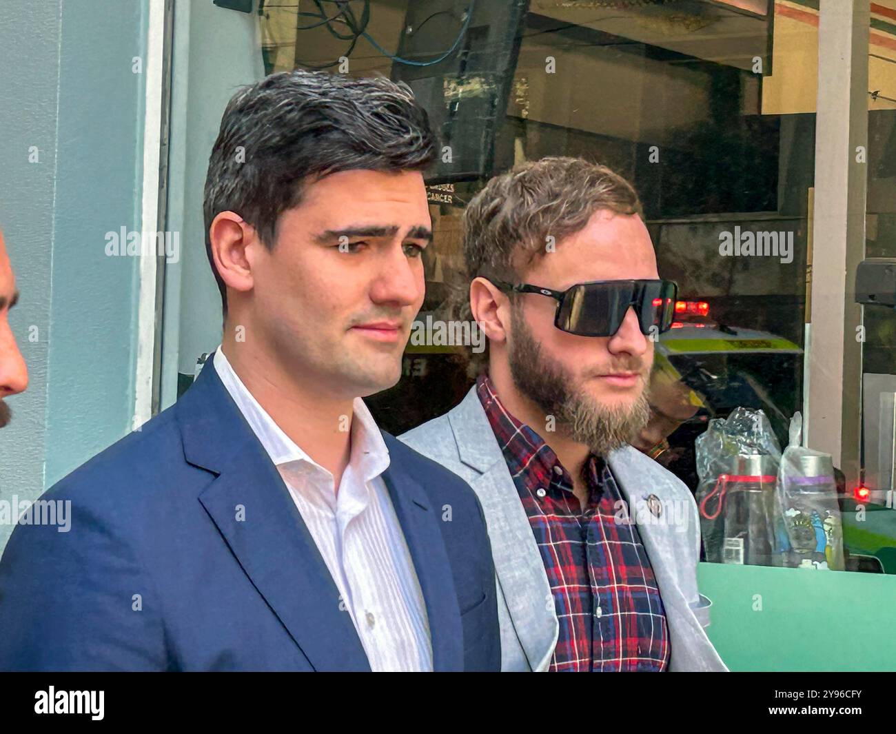 Jacob Hersant, left, a self-described Nazi, walks from the Melbourne ...