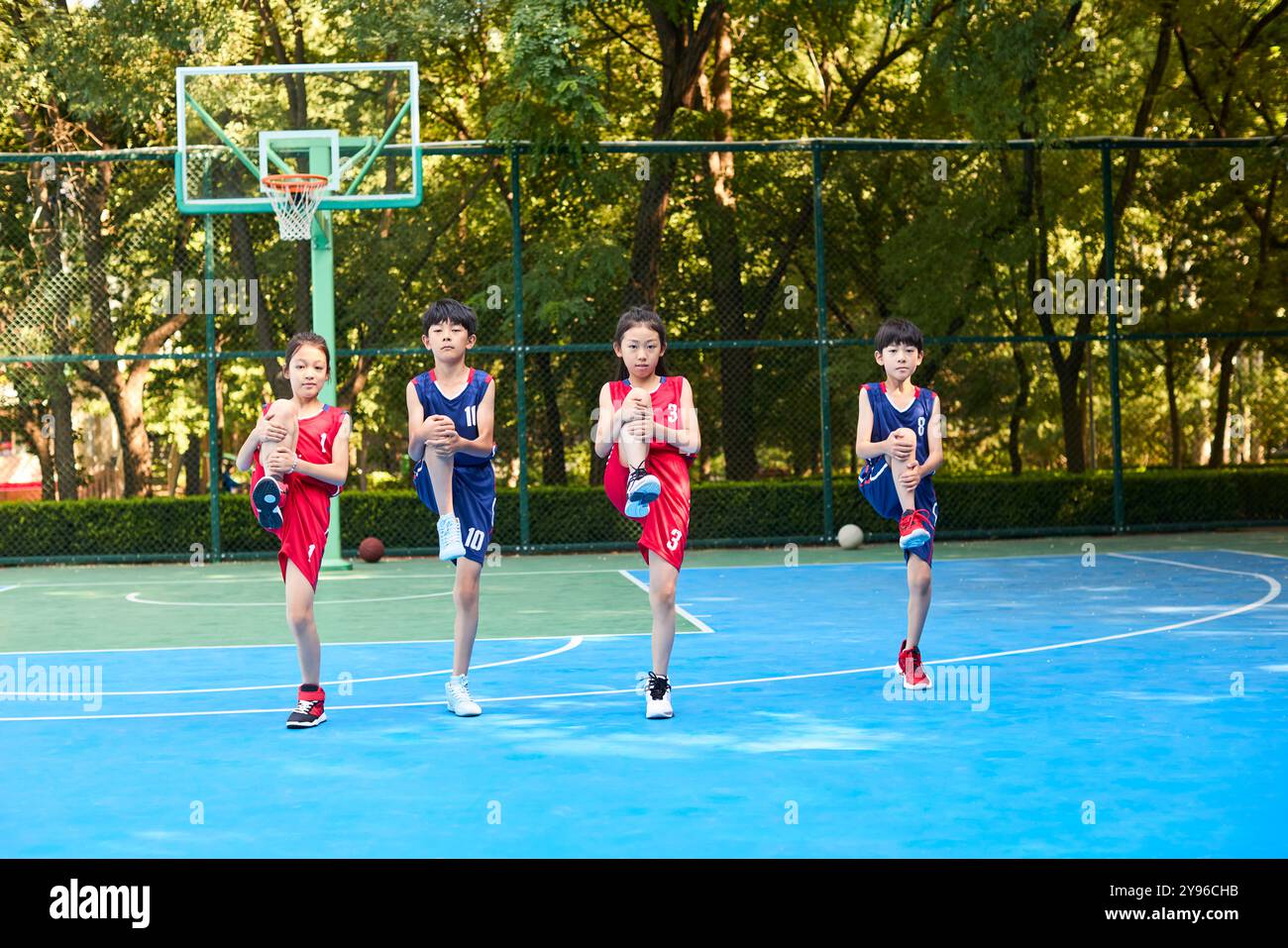 Kids Warming Up During Basketball Training Class Stock Photo - Alamy