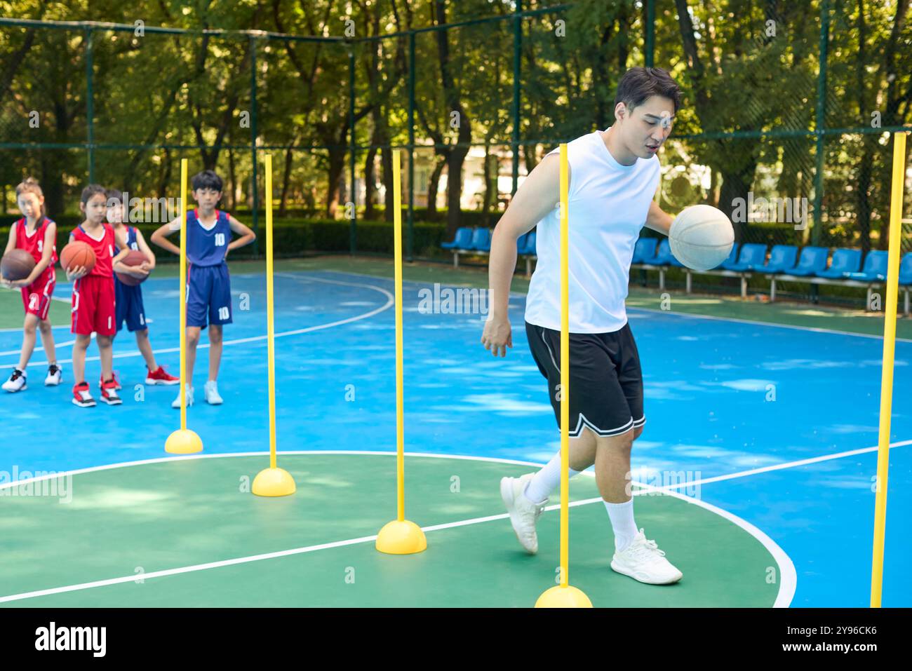 Kids Warming Up During Basketball Training Class Stock Photo - Alamy