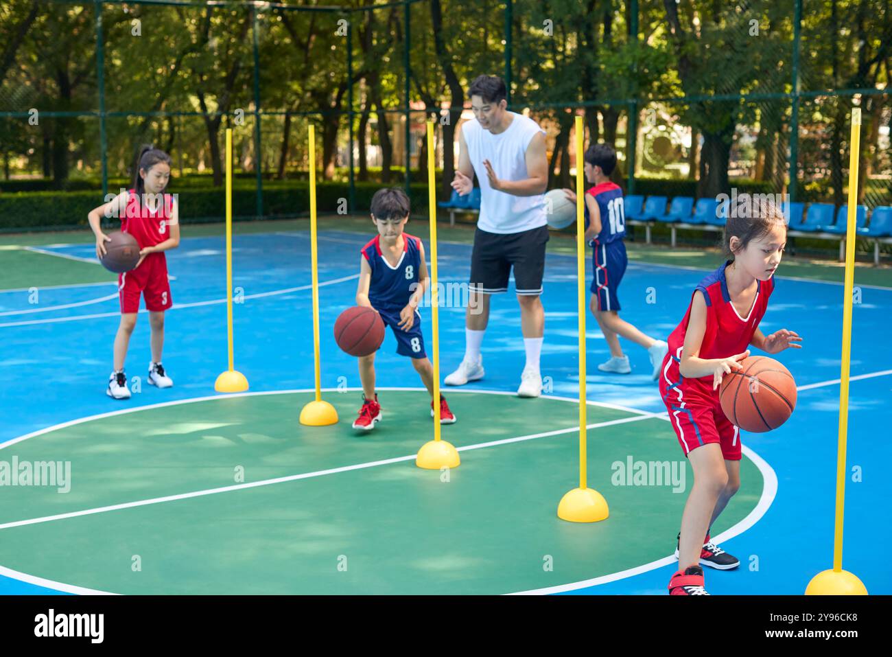 Kids Warming Up During Basketball Training Class Stock Photo - Alamy