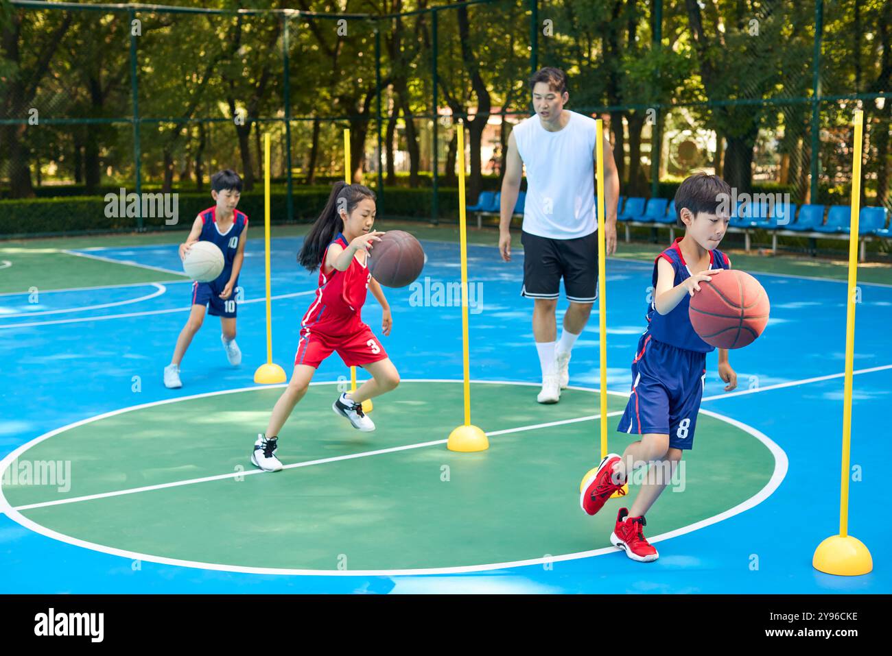 Kids Warming Up During Basketball Training Class Stock Photo - Alamy