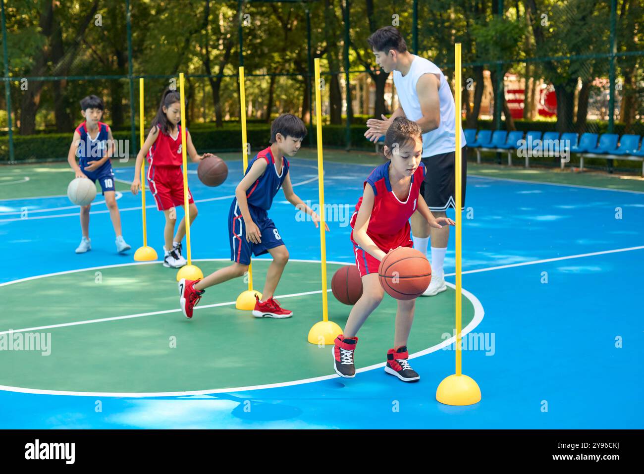 Kids Warming Up During Basketball Training Class Stock Photo - Alamy