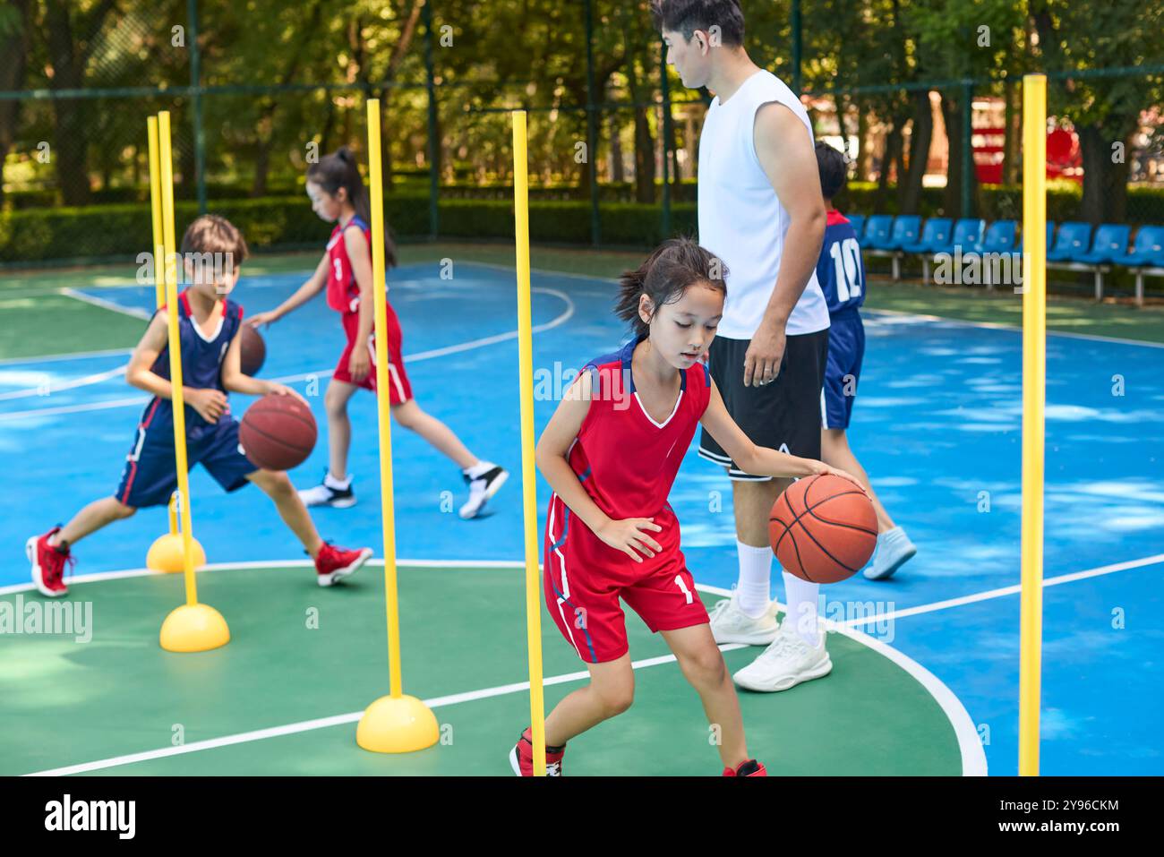 Kids Warming Up During Basketball Training Class Stock Photo - Alamy