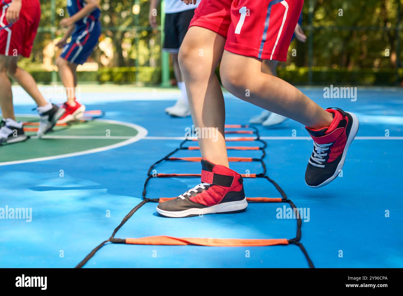 Kids Warming Up During Basketball Training Class Stock Photo - Alamy
