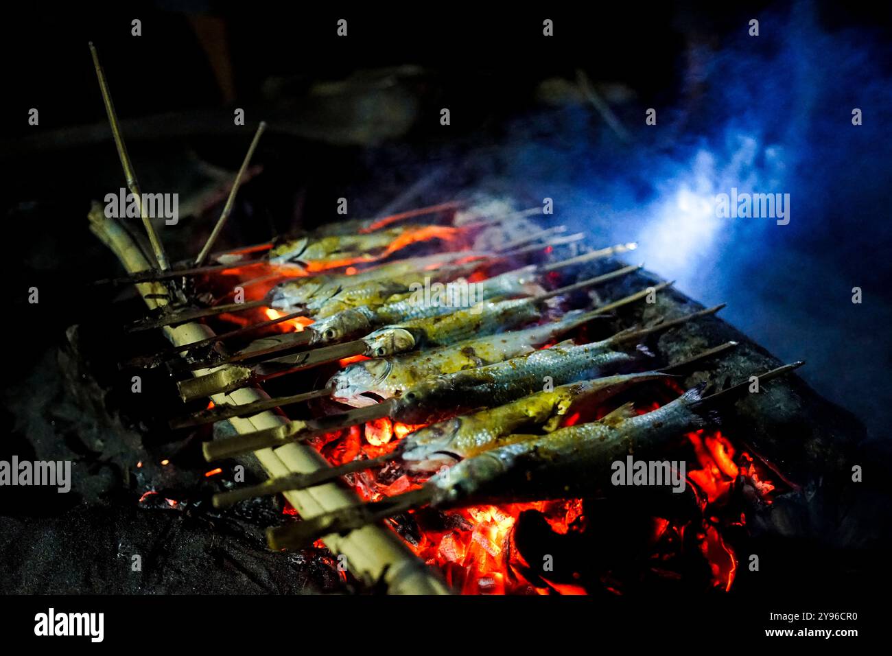 grilled fish stabbed using bamboo Stock Photo - Alamy