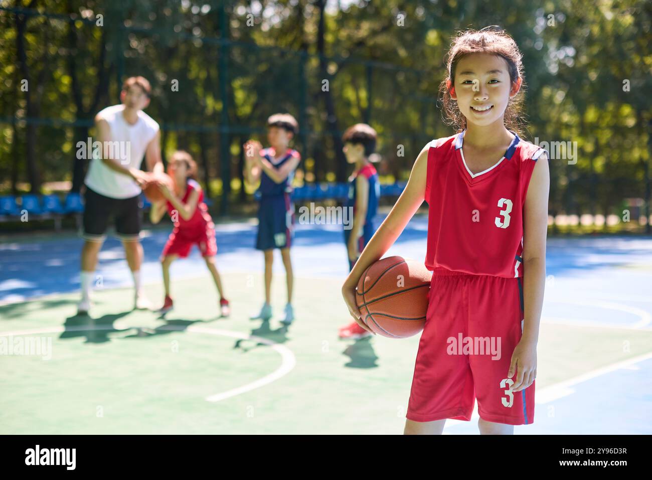 Coach and Kids in Basketball Training Class Stock Photo - Alamy