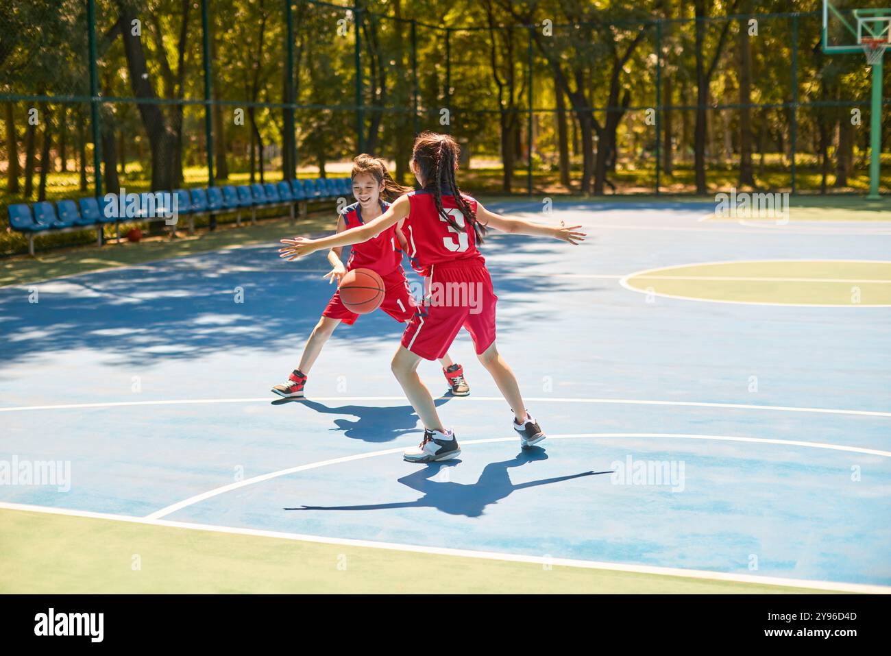 Kids Playing Basketball on Basketball Court Stock Photo - Alamy