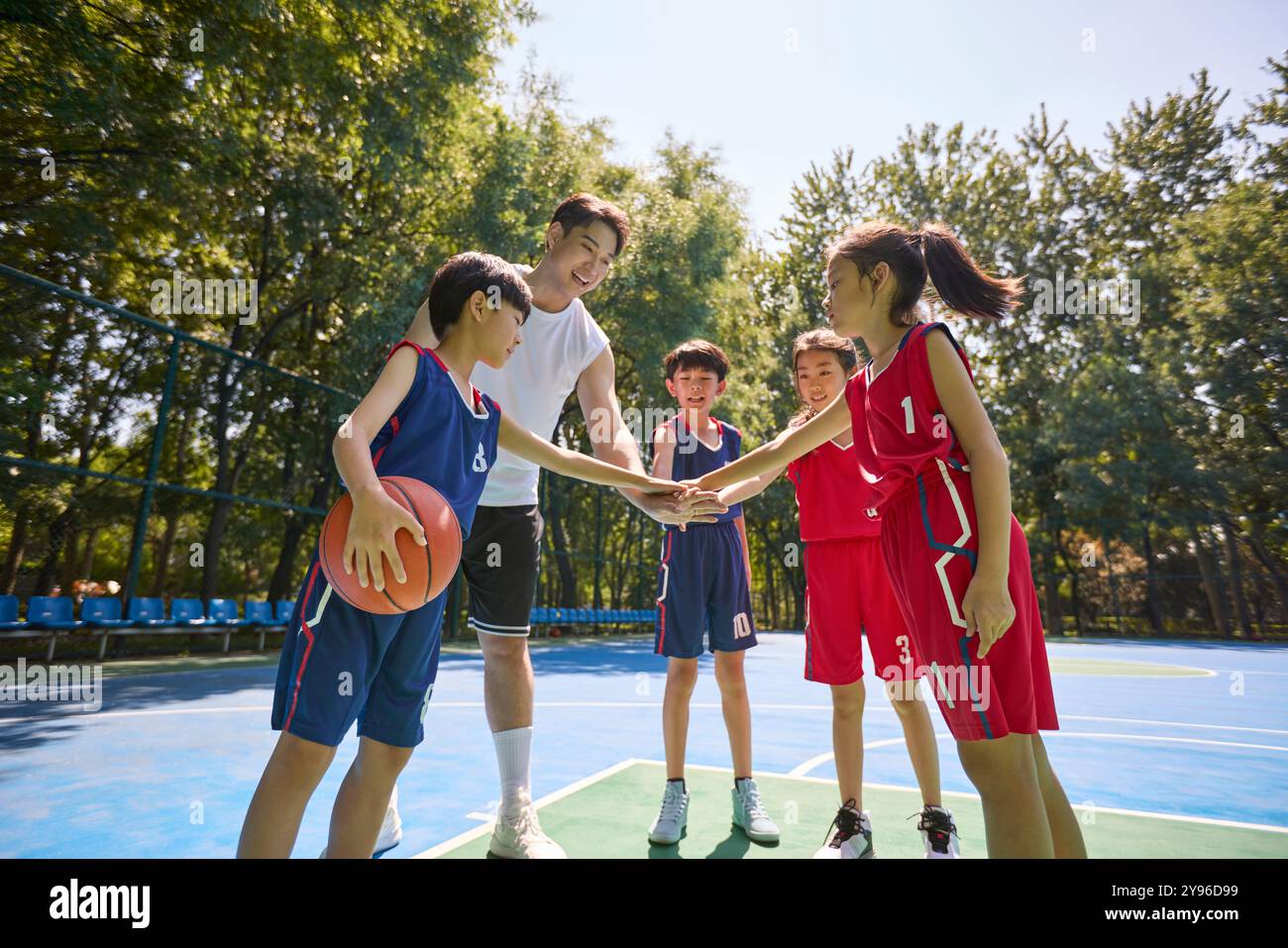 Coach and Kids in Basketball Training Class Stock Photo - Alamy