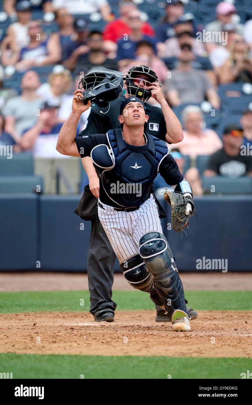 New York Yankees catcher Ben Rortvedt (38) tracks a popup during an MLB ...