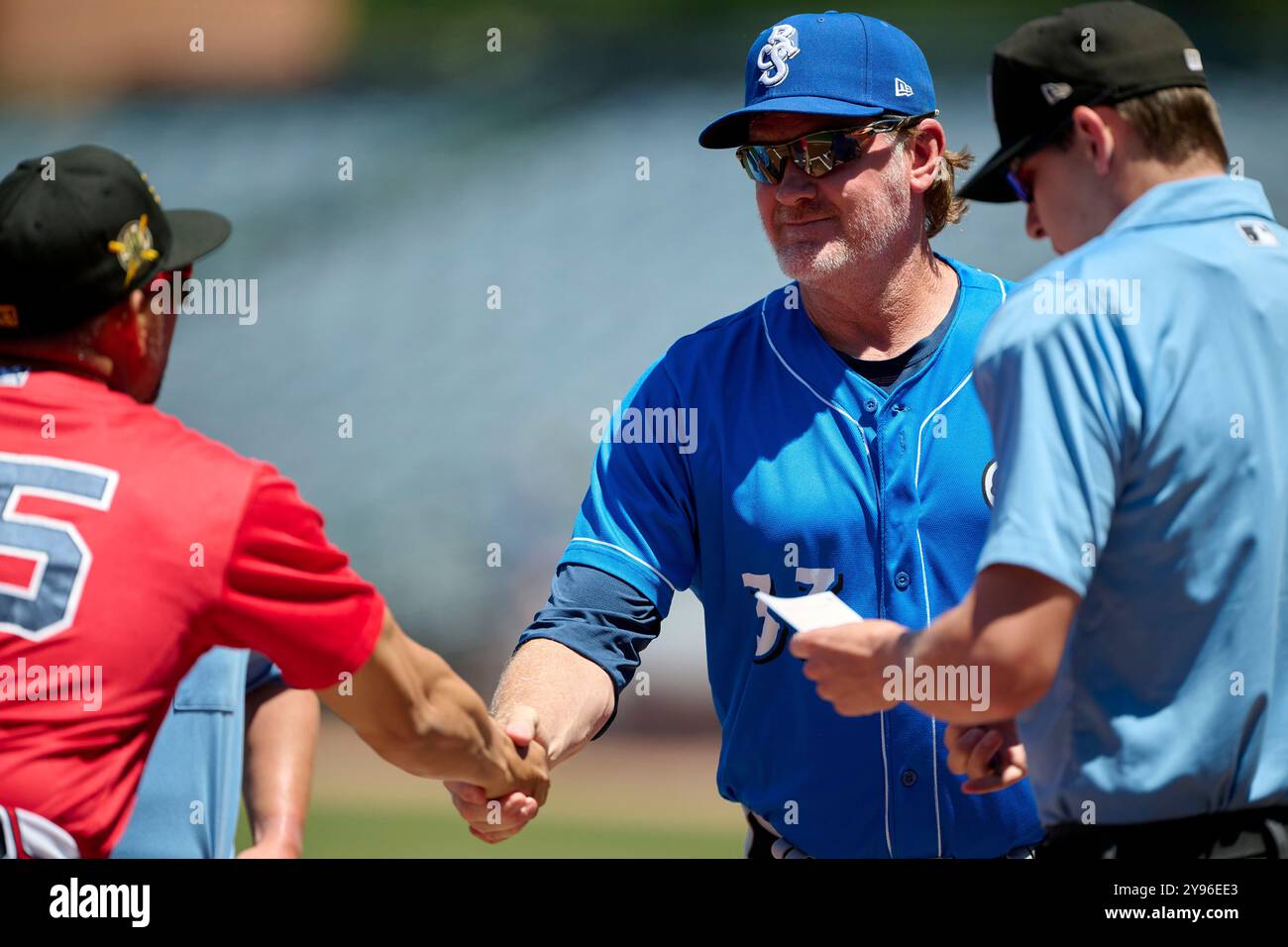 Biloxi Shuckers manager Joe Ayrault (33) during the lineup exchange ...