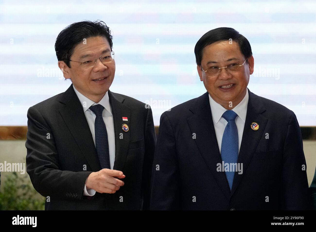 Singapore Prime Minister Lawrence Wong, left, and Laos Prime Minister ...