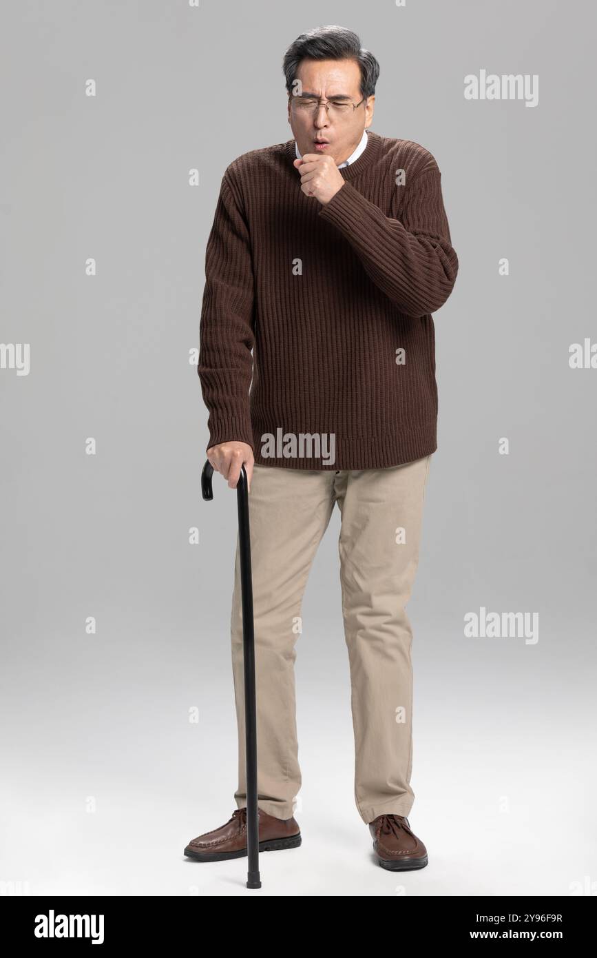 Senior man not feeling well Stock Photo - Alamy