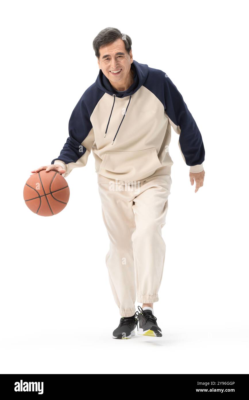 Indian man playing basketball hi-res stock photography and images - Alamy