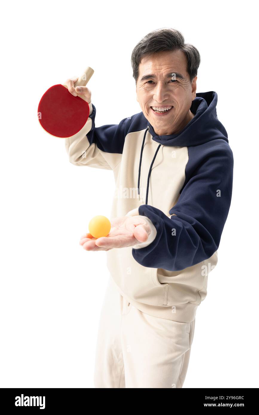 Happy senior man playing table tennis Stock Photo - Alamy