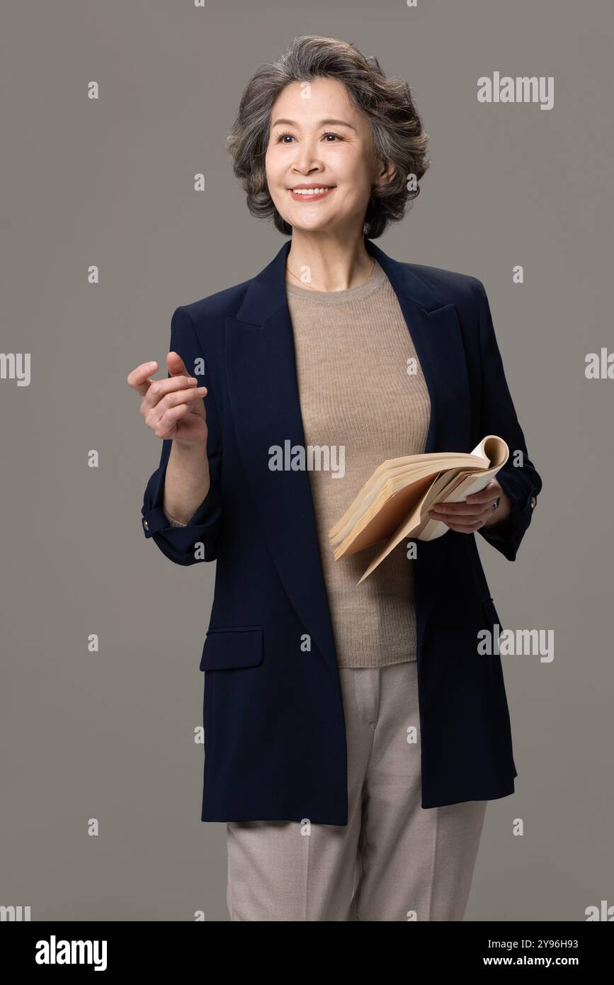 Female professor talking hi-res stock photography and images - Alamy