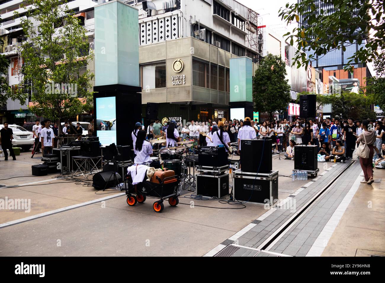 Music band of thai student girls group acting musician and dancing to ...