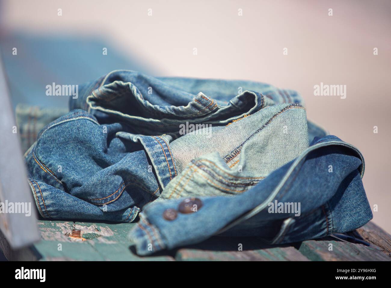 Lonely Jacket Left Behind on a bench Stock Photo - Alamy