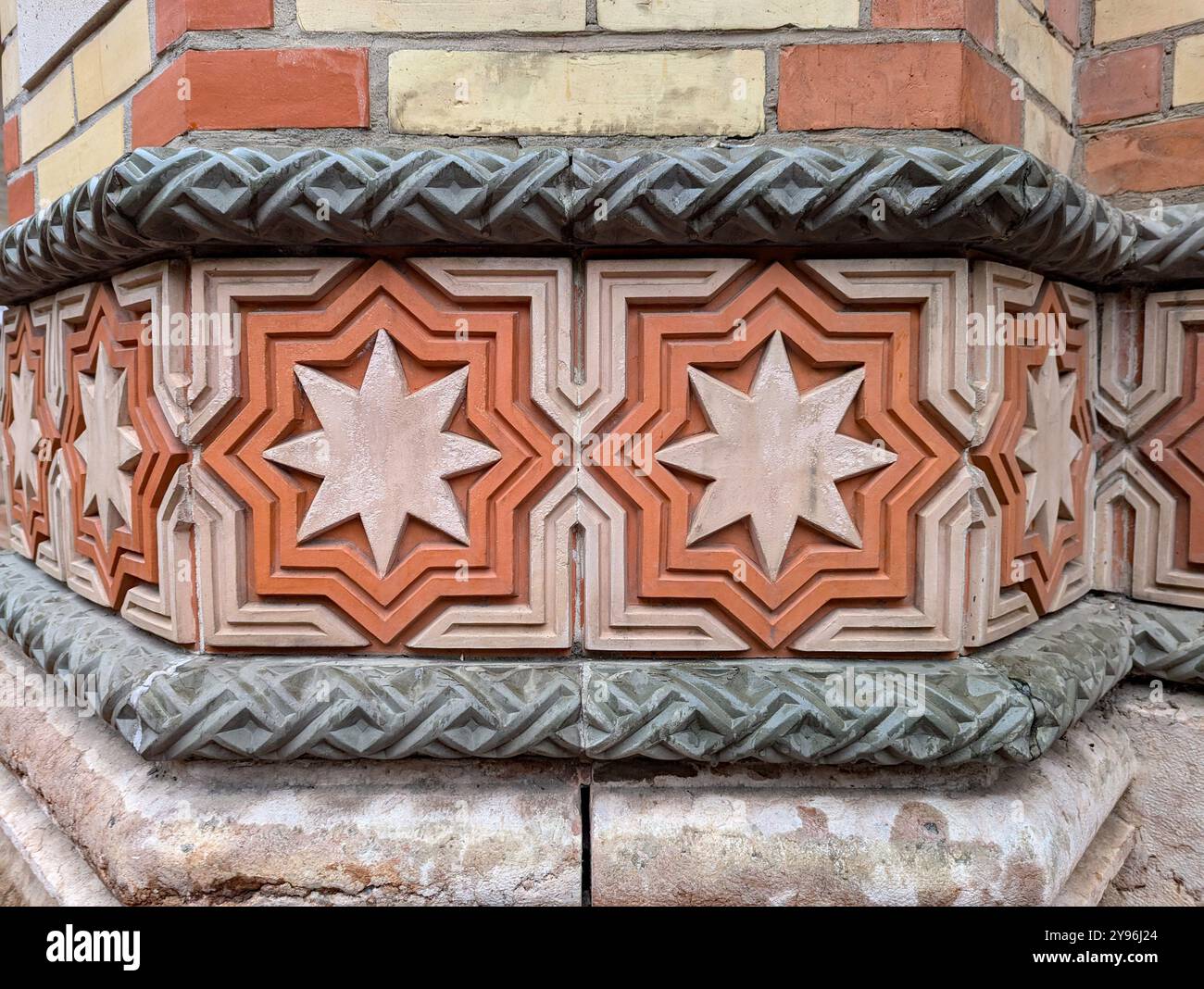 Detail of the colorful brick and stone designs on the exterior of the ...