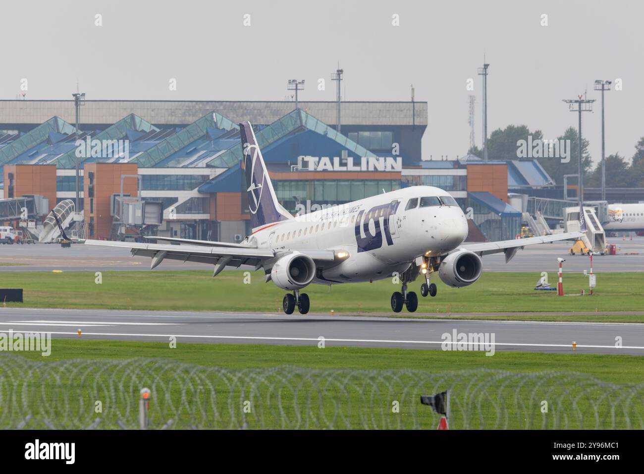 LOT Polish Airnlines Embraer 170 landing to Tallinn airport in Estonia ...
