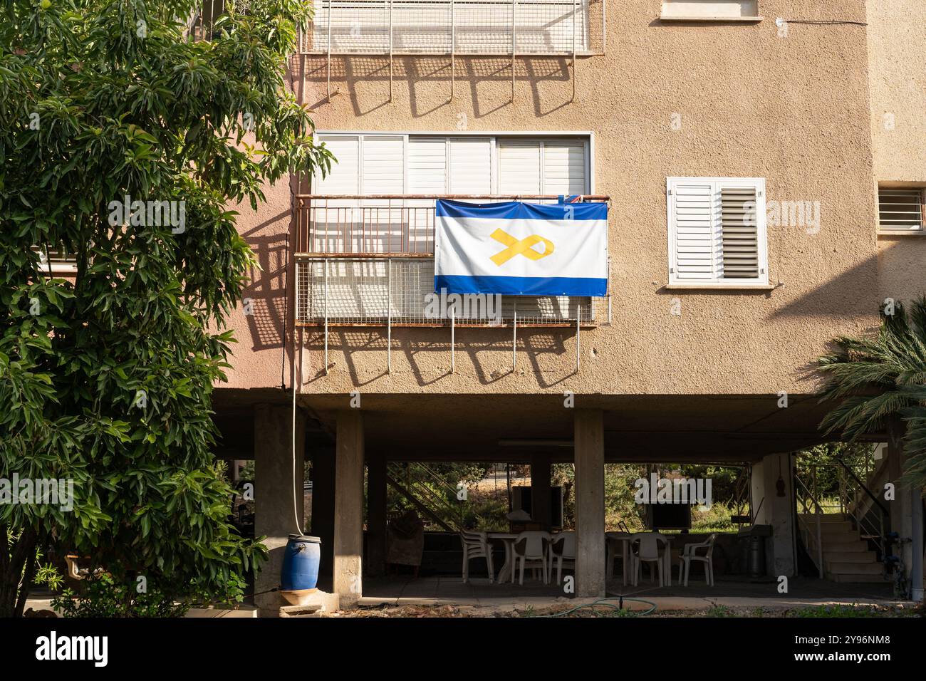 27 September 2024, Tzora, Israel. Blue and white flag featuring a ...