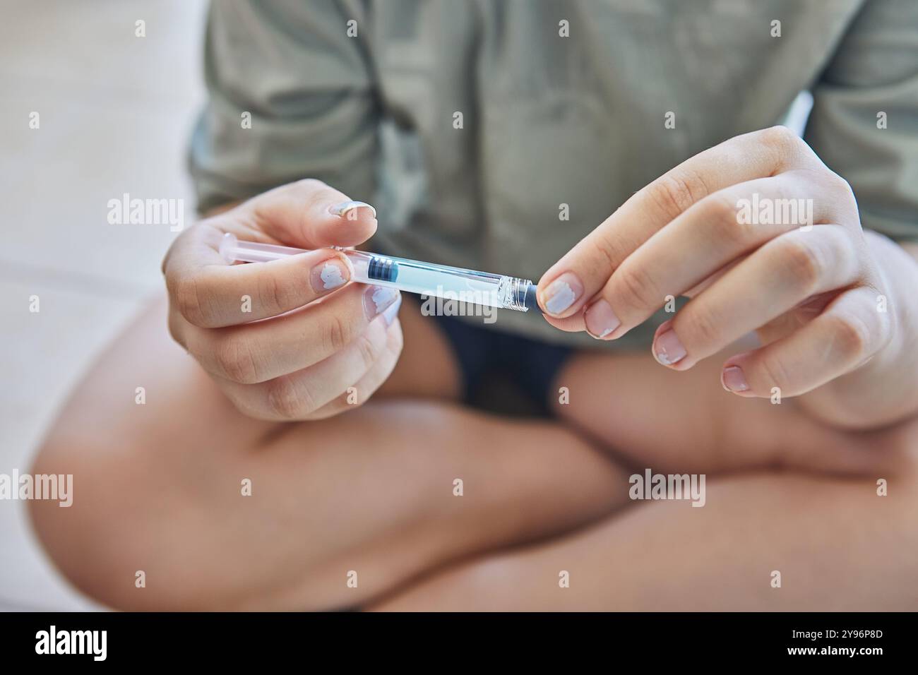 Hand cutting medication packaging with scissors Stock Photo - Alamy