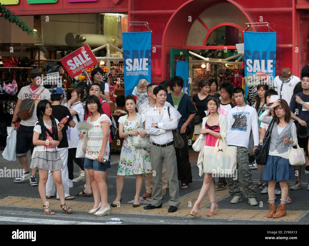 TOKYO, JAPAN-JULY 21,2008:Unidentified Young Japanese People waiting at ...
