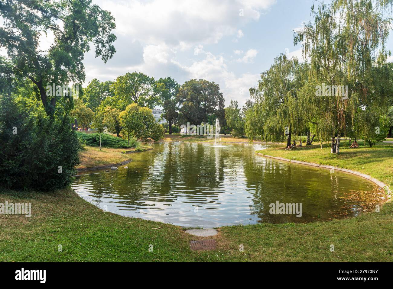 Small pool in Schweizergarten public park in Vienna city in Austria ...
