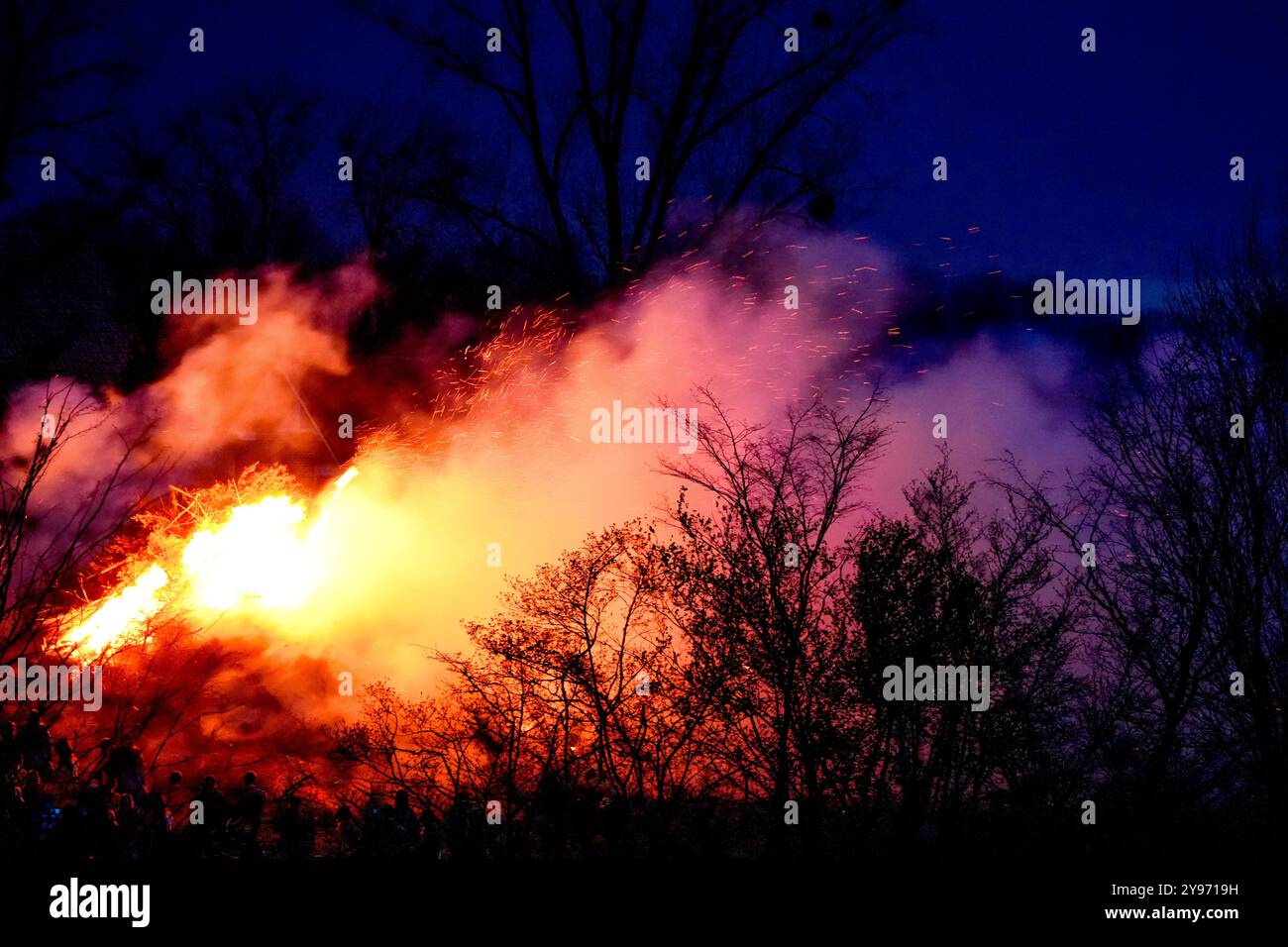 Big fire at night. Fire in nature. Easter fire. Clouds of smoke Stock ...