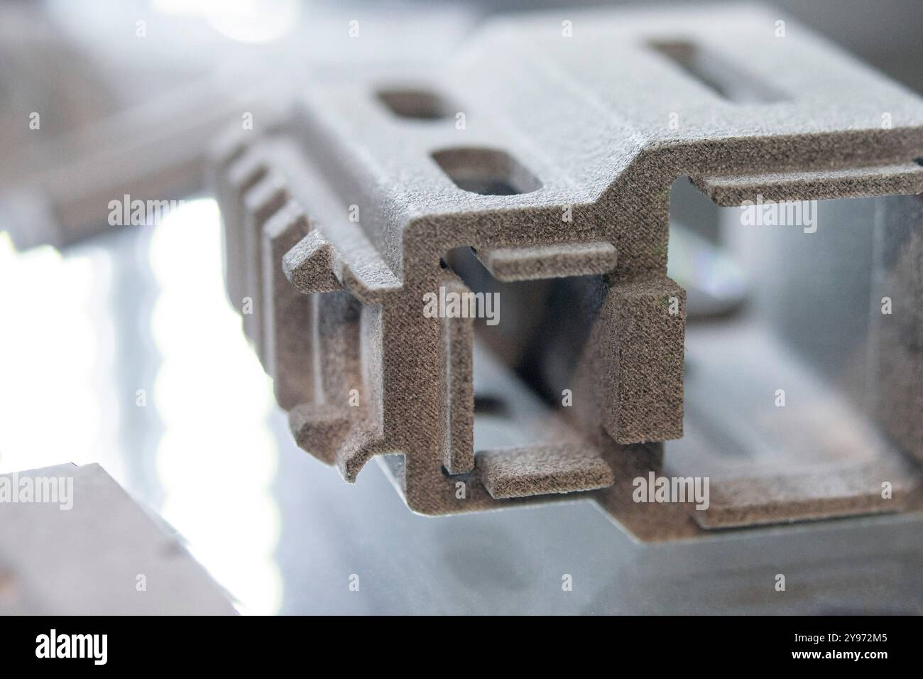 Object printed on a 3D printer from molten plastic powder close-up ...