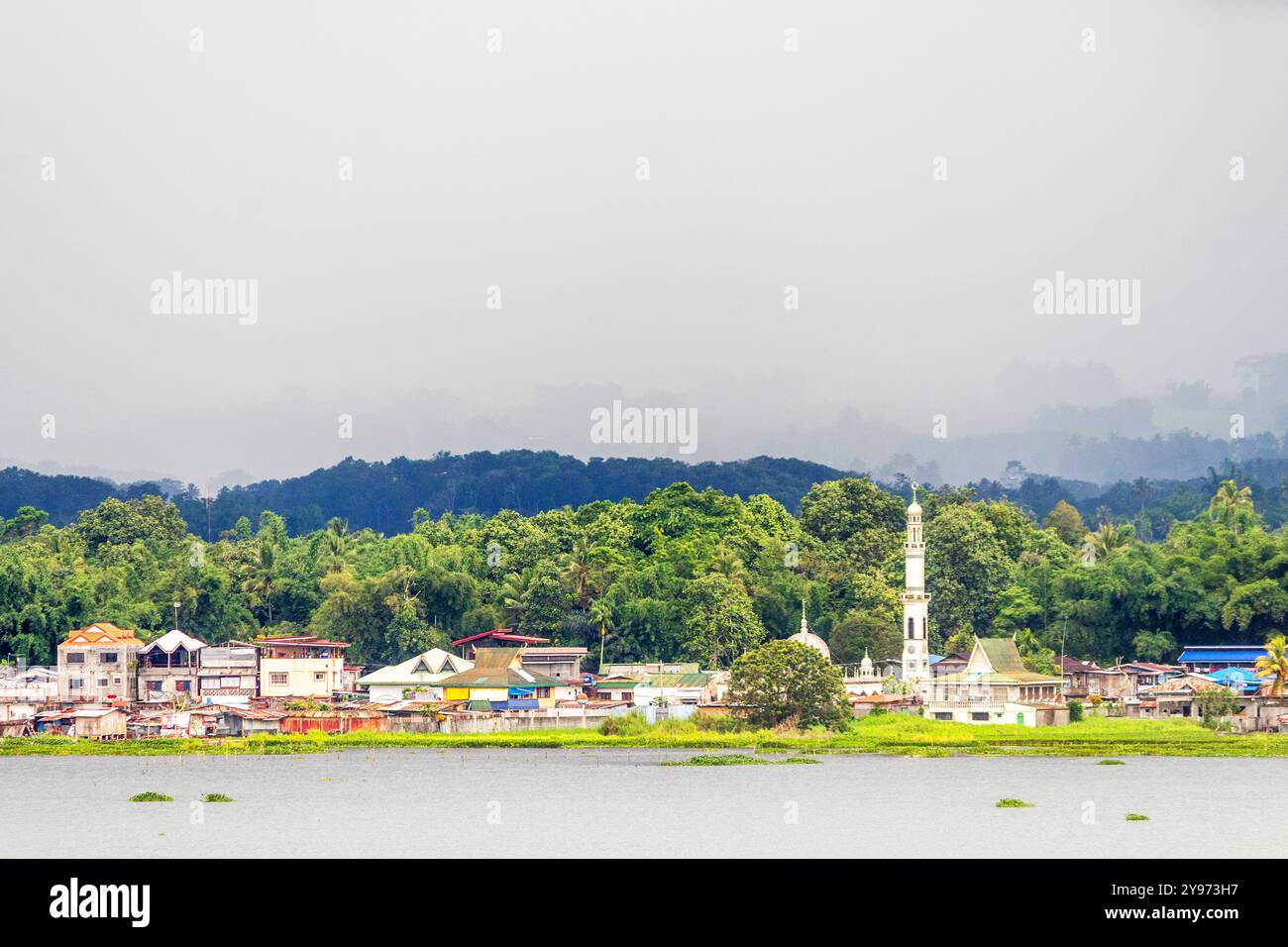 Lanao Lake shore community with a mosque in Lanao del Sur Philippines ...